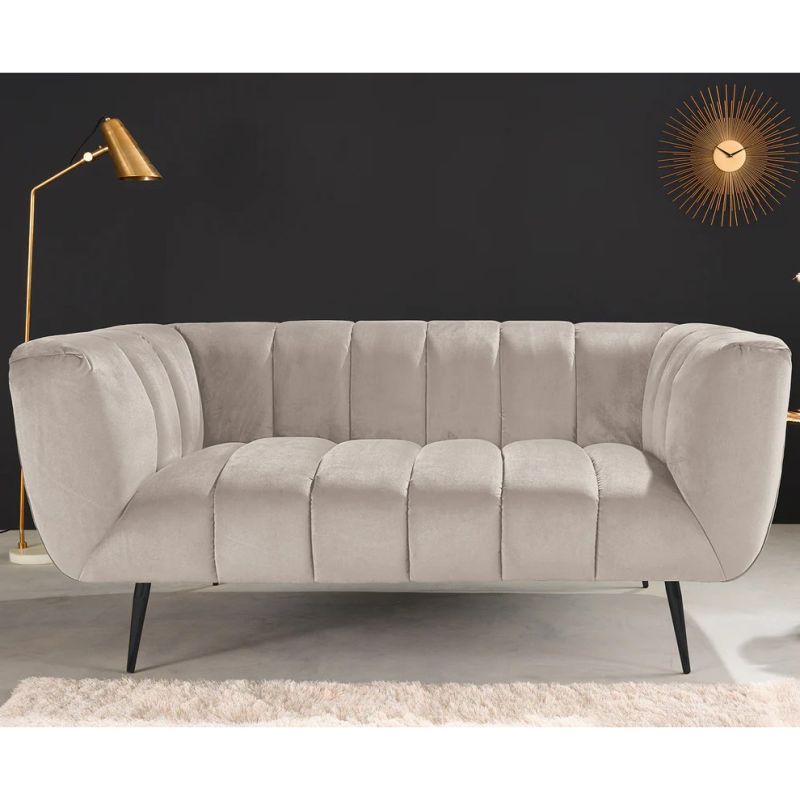 LETO 2 seater sofa in champagne coloured velvet with black legs